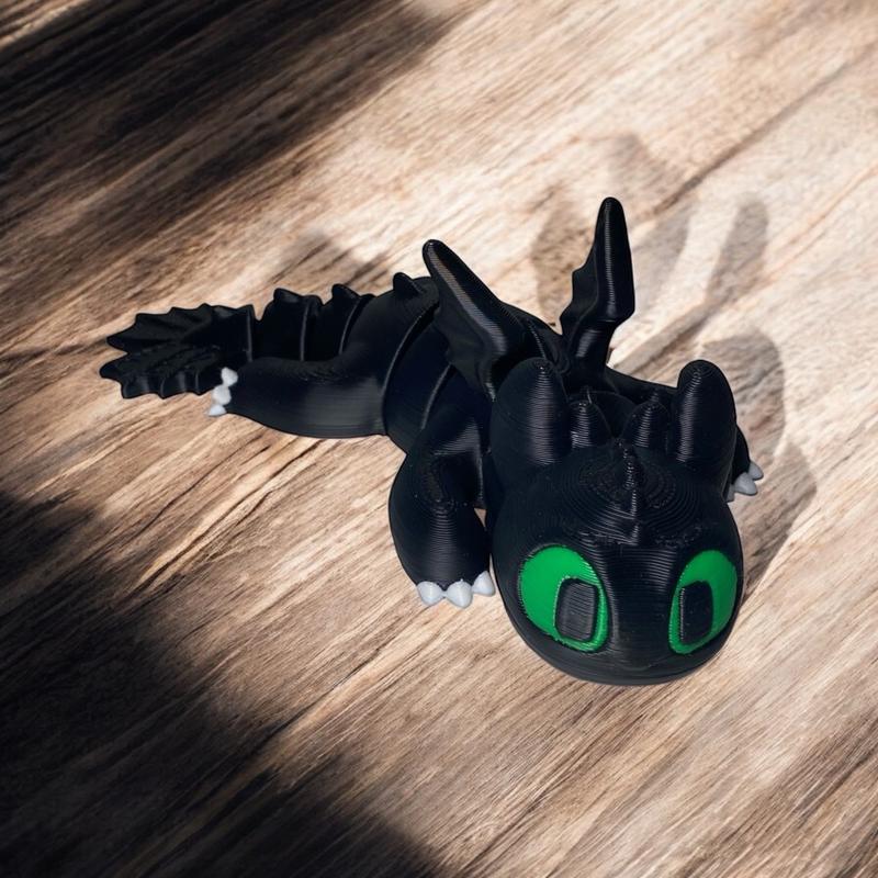 Toothless flexi dragon figurine - TikTok Shop