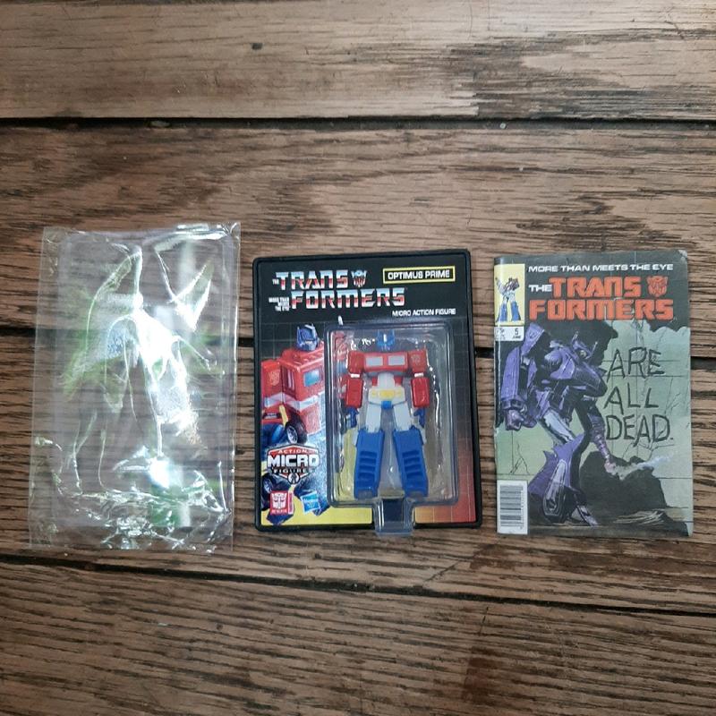 Worlds smallest toy Transformers Optimus Prime with comic - TikTok Shop